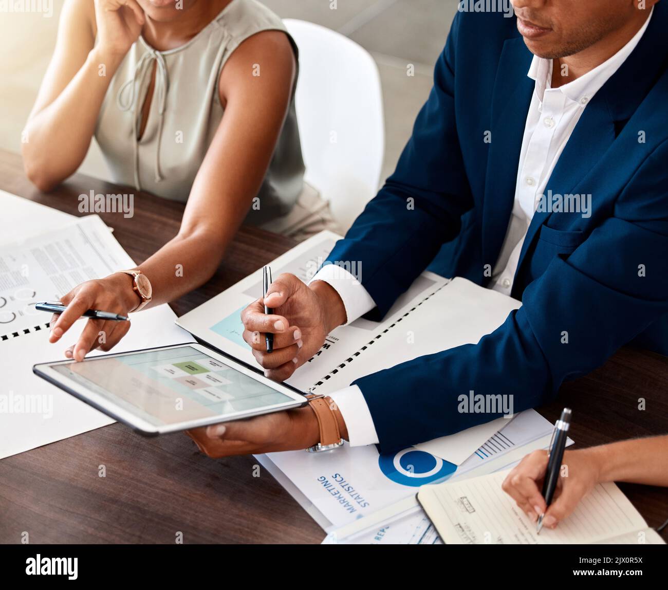 Business manager, ceo or leader holding digital tablet presenting ...