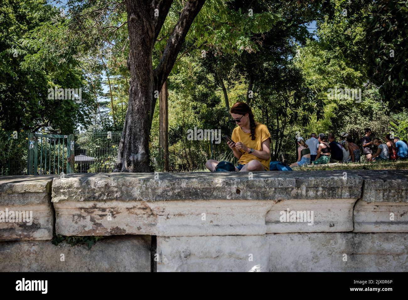 Old Town street full of people artists tourists art posters during the ...