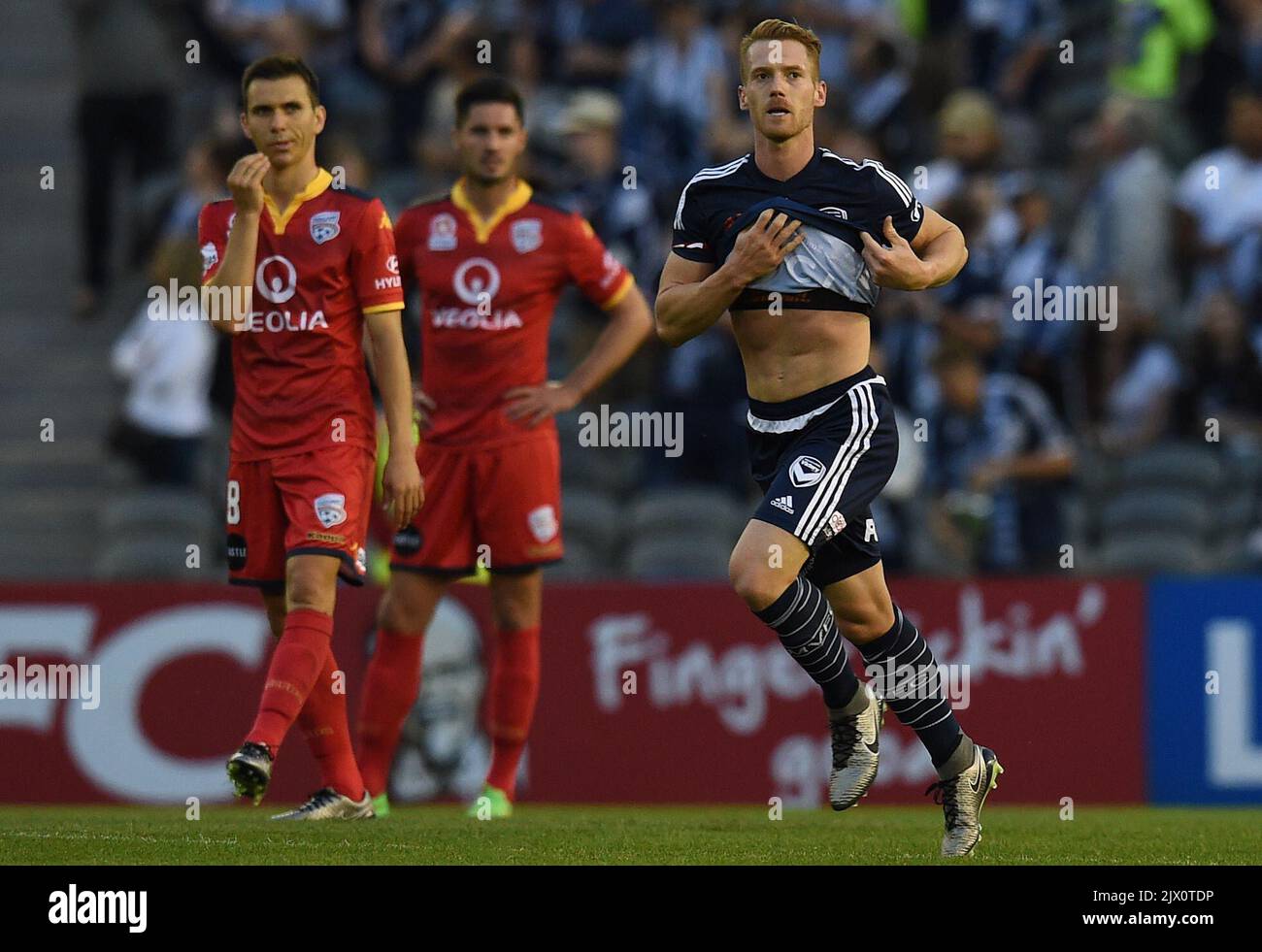 Oliver Bozanic of the Victory celebrates scoring their second goal ...