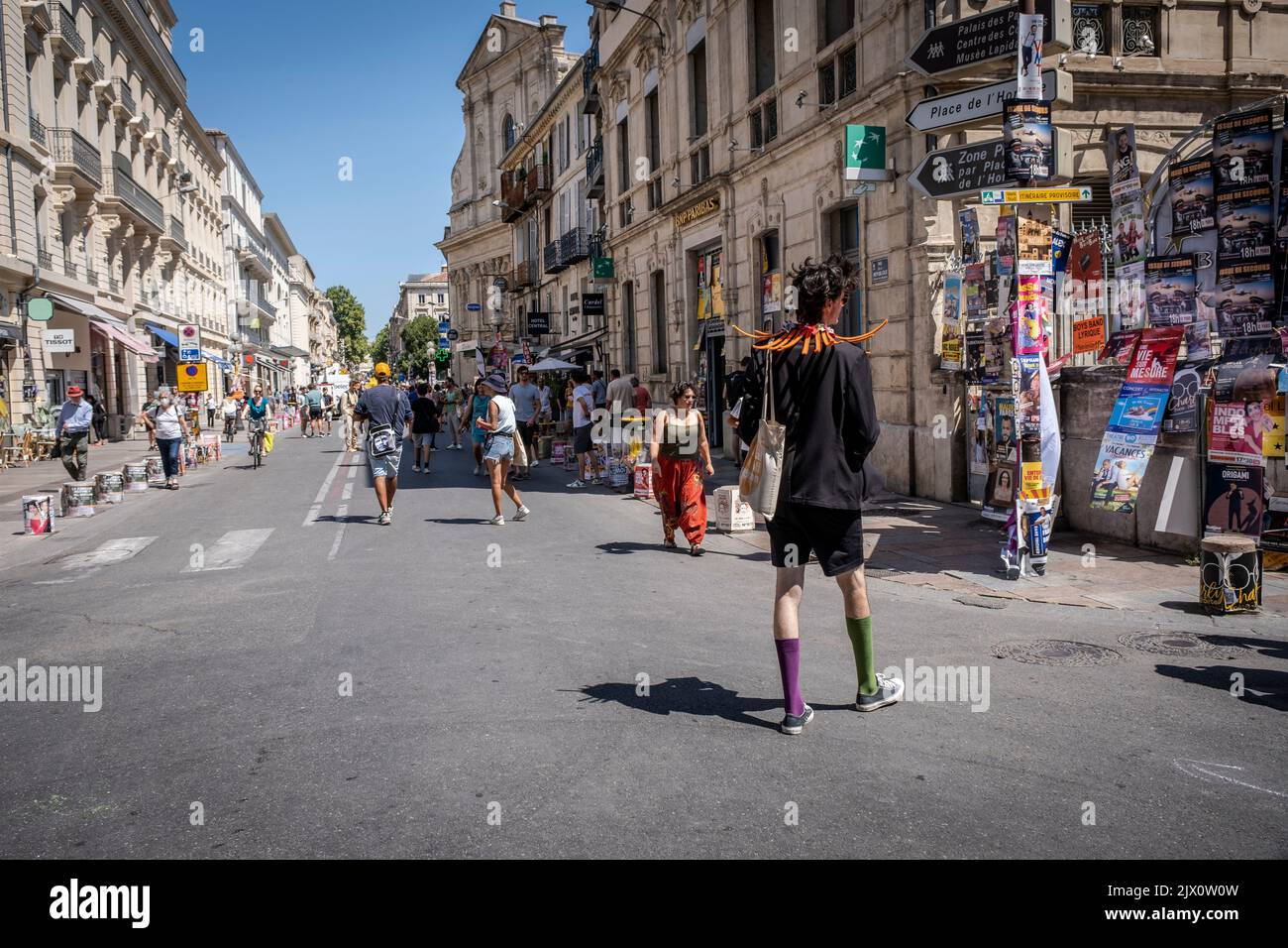 Old Town street full of people artists tourists art posters during the ...