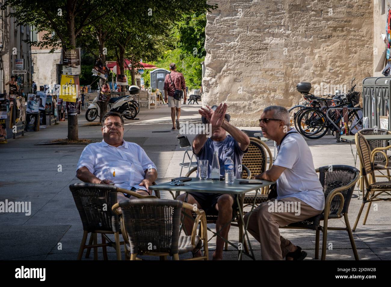 Old Town street full of people artists tourists art posters during the ...