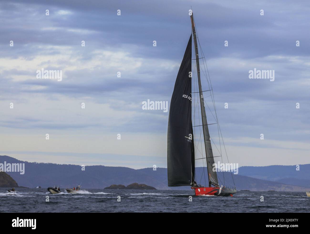 Line honours winner of the Sydney Hobart Yacht Race Comanche, close to ...