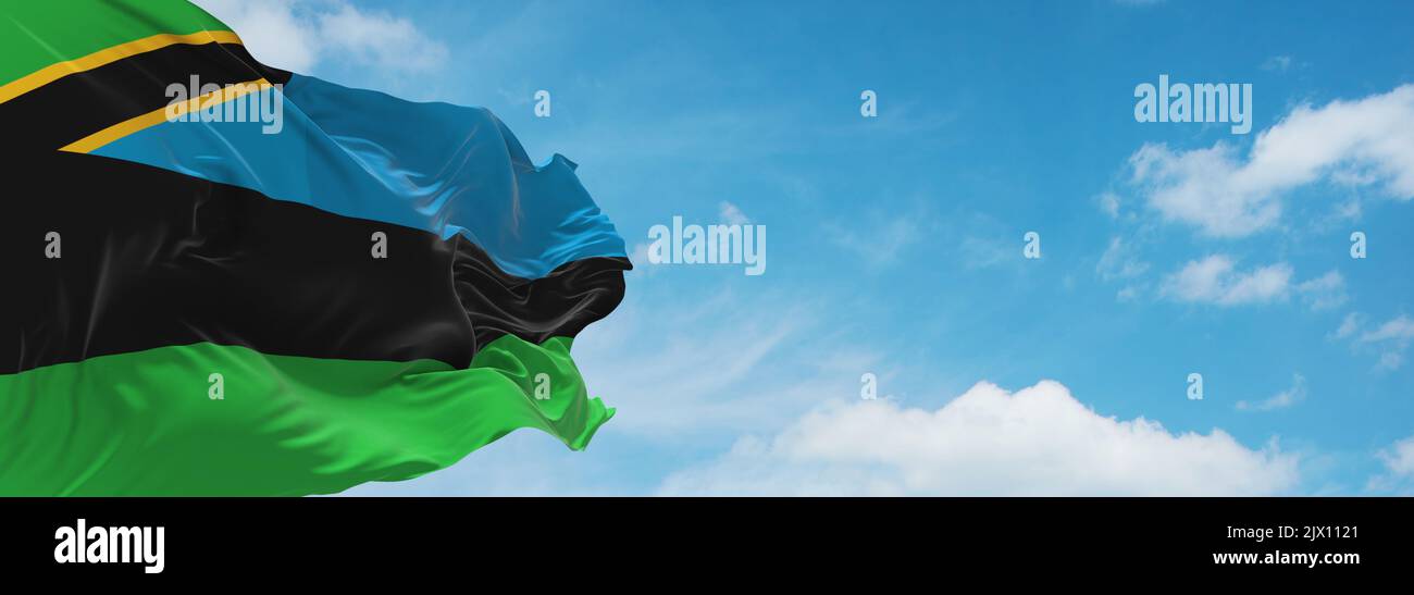 flag of African Arabs Zanzibaris at cloudy sky background, panoramic ...