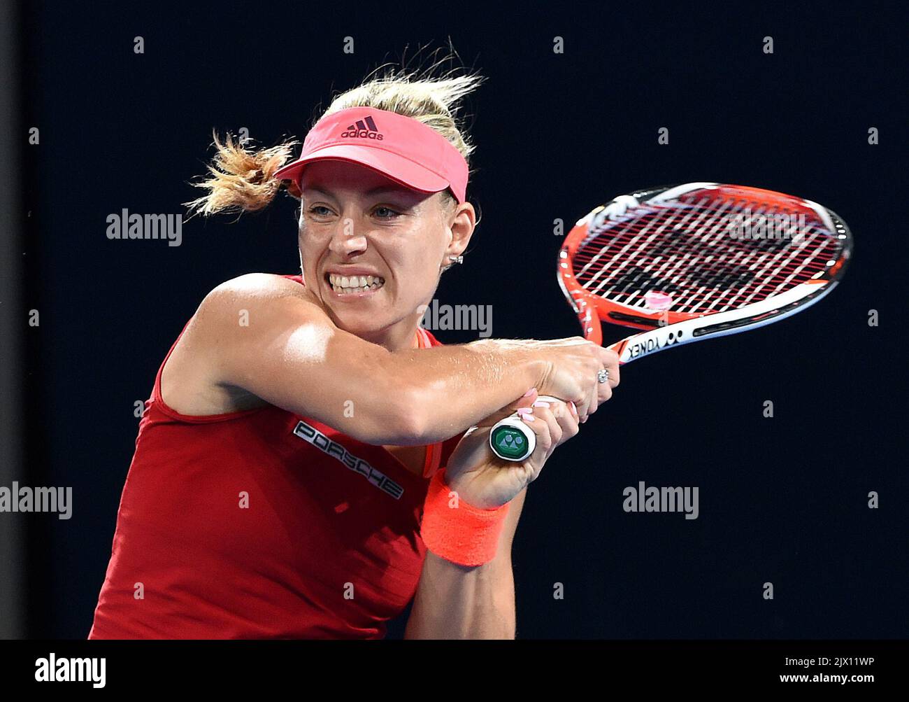 Angelique Kerber of Germany looks on after returning the ball to ...