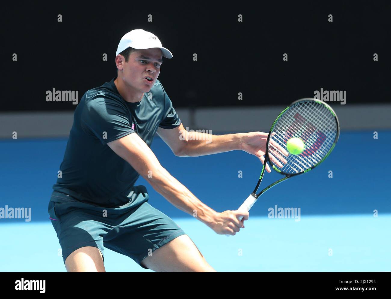 Milos Raonic practices for the Australian Open tennis on Rod Laver ...