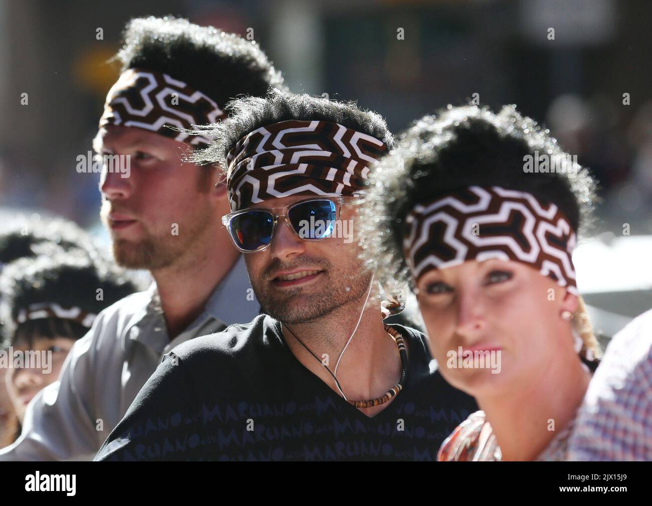 People wear Zoolander wigs as they wait outside for the 'Ridiculously ...