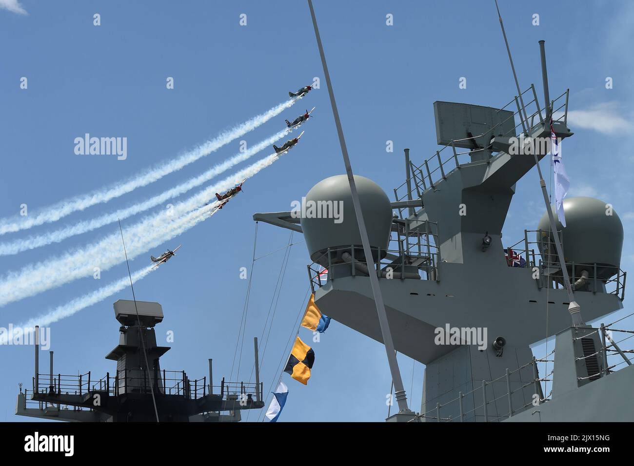 A fly past over HMAS Adelaide, Australia's newest Canberra Class ...