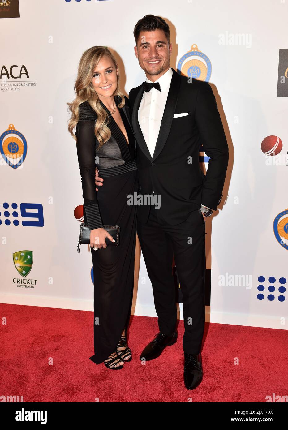 Australian bowler Marcus Stoinis (right) and and his partner Stephanie ...
