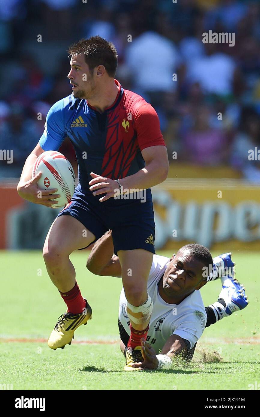 Arthur Retiere of France steps through a Fiji tackle during round 4 of ...