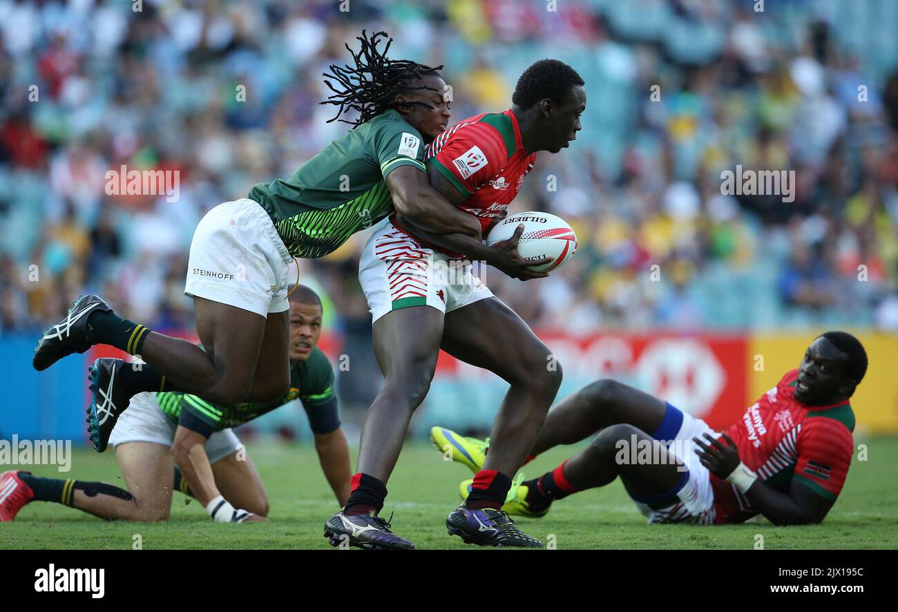 South Africa's Seabelo Senatla(left) tackles Kenya's Billy Odhiambo ...