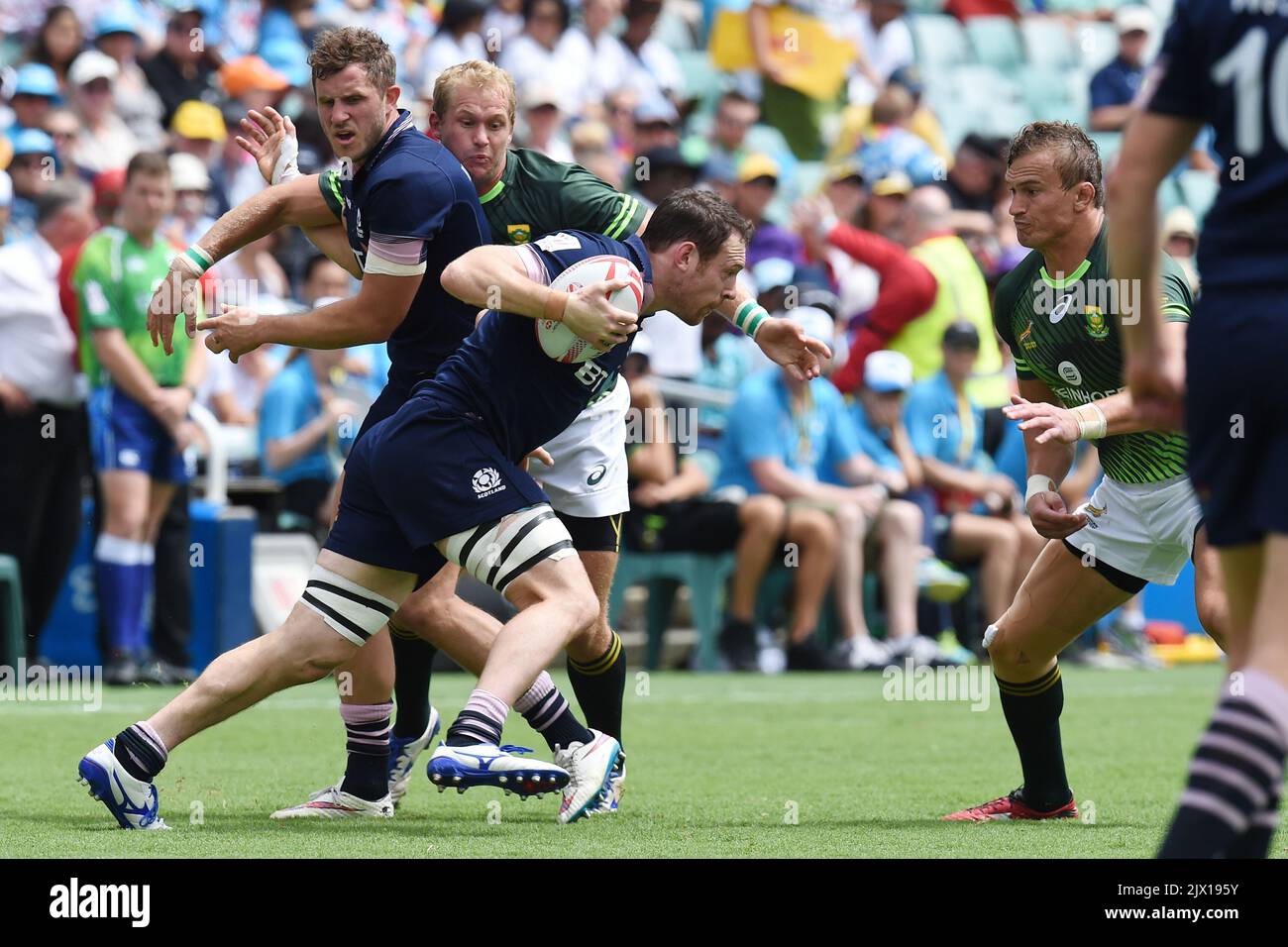 Scott Riddell of Scotland finds a break in South Africa's defence ...