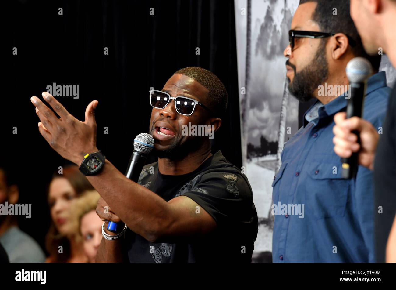Comedian Kevin Hart and rapper and actor Ice Cube (right) arrive at the ...