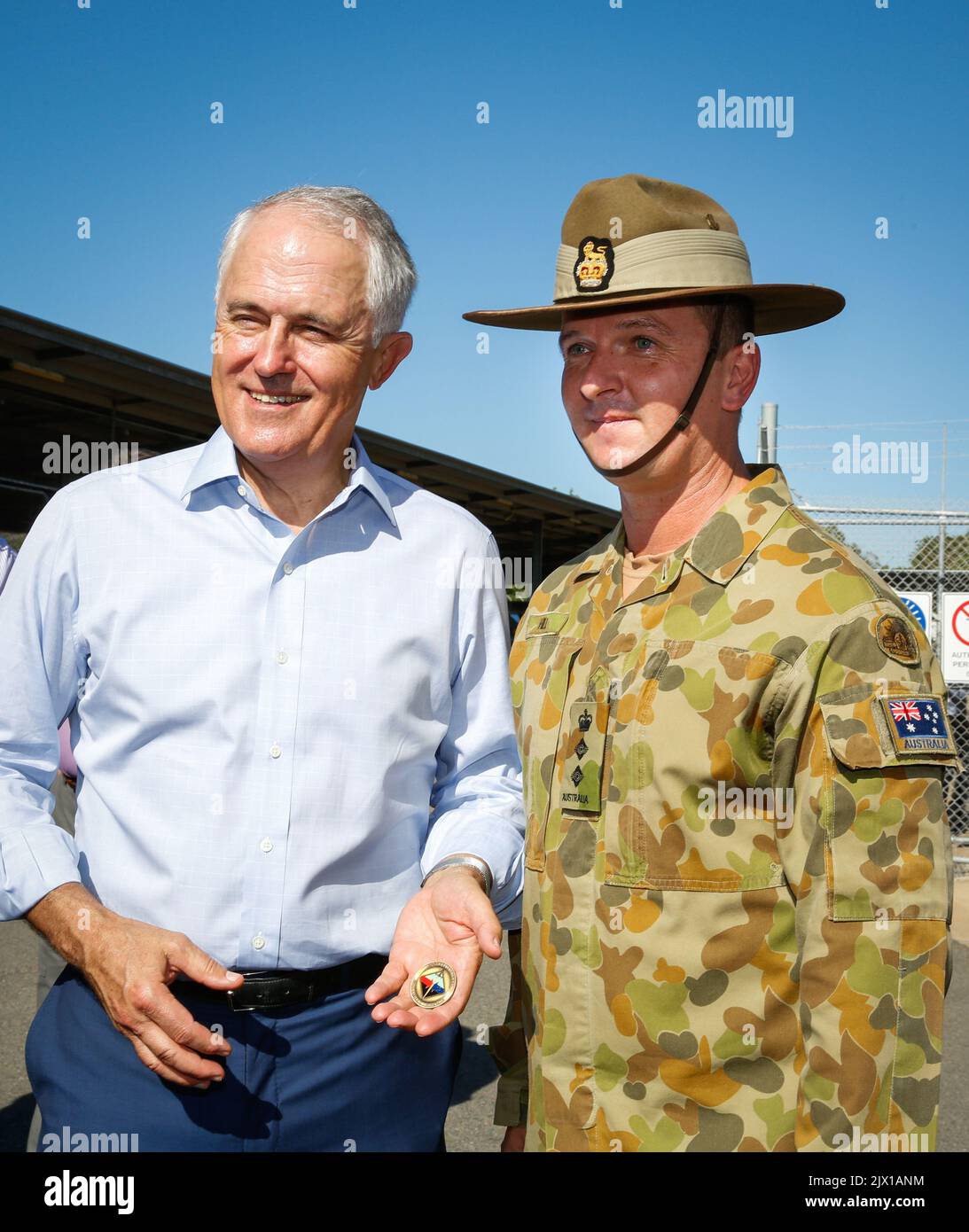 Prime Minister Malcolm Turnbull (Left) accepts a Combat Training Centre ...
