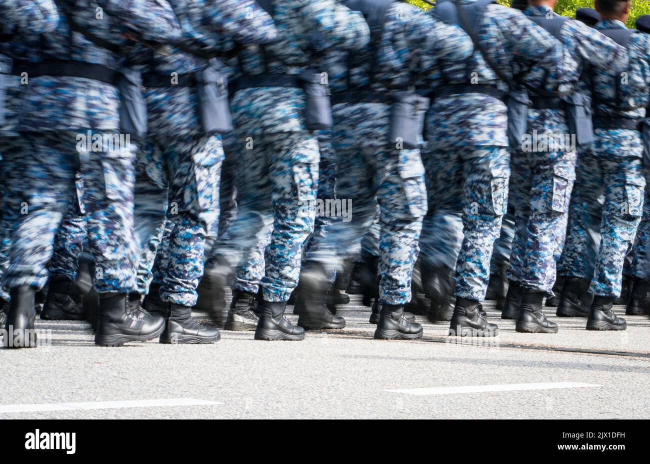 Soldiers marching, slow shutter to depict motion Stock Photo - Alamy