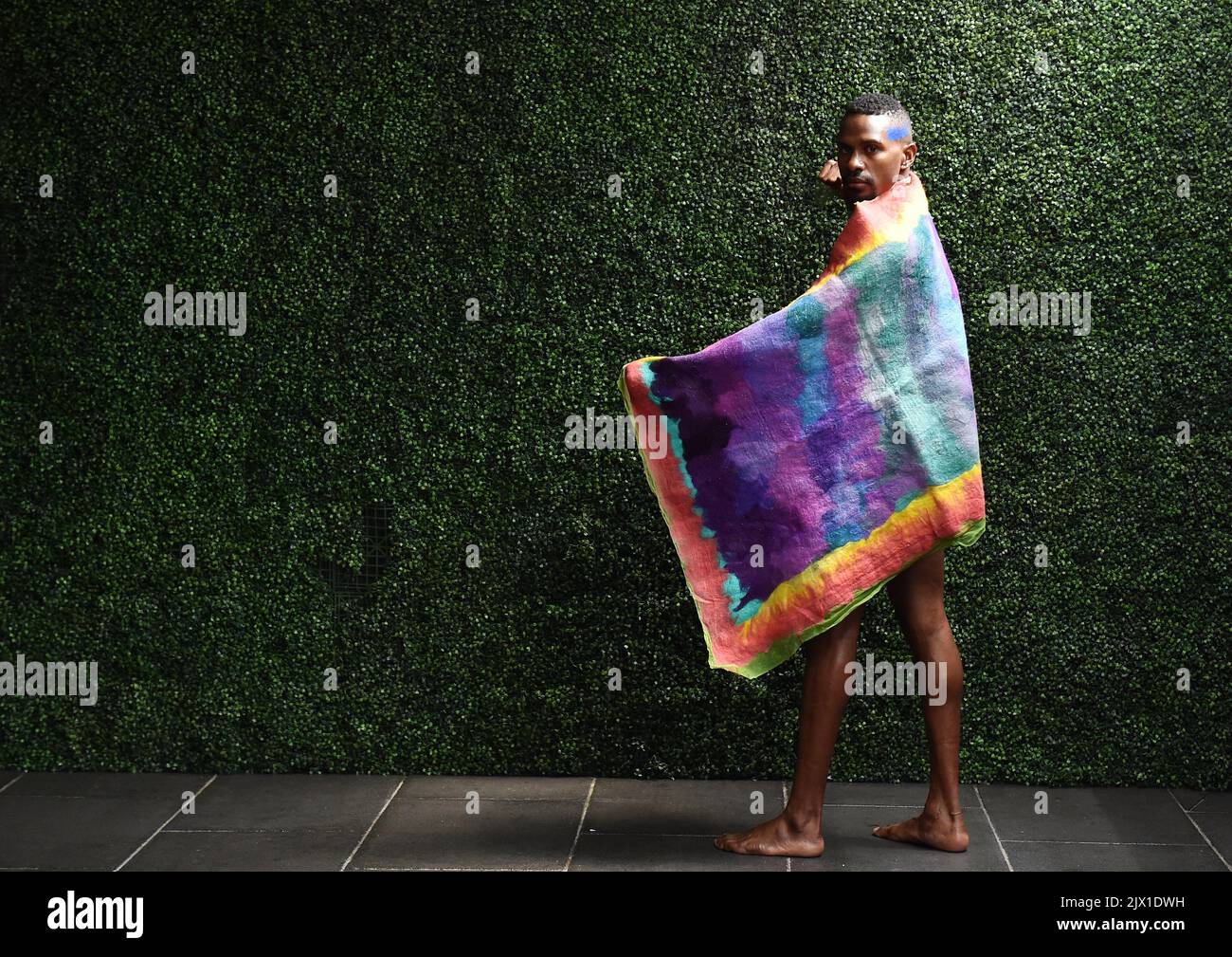 Indigenous models Hans David Ahwang from the Torres Strait wearing an ...