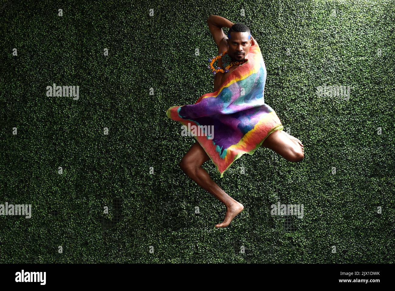 Indigenous models Hans David Ahwang from the Torres Strait wearing an ...