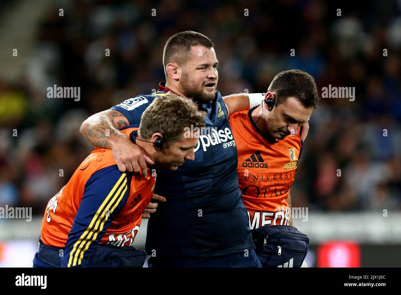 Brendon Edmonds of the Highlanders receives medical attention during ...