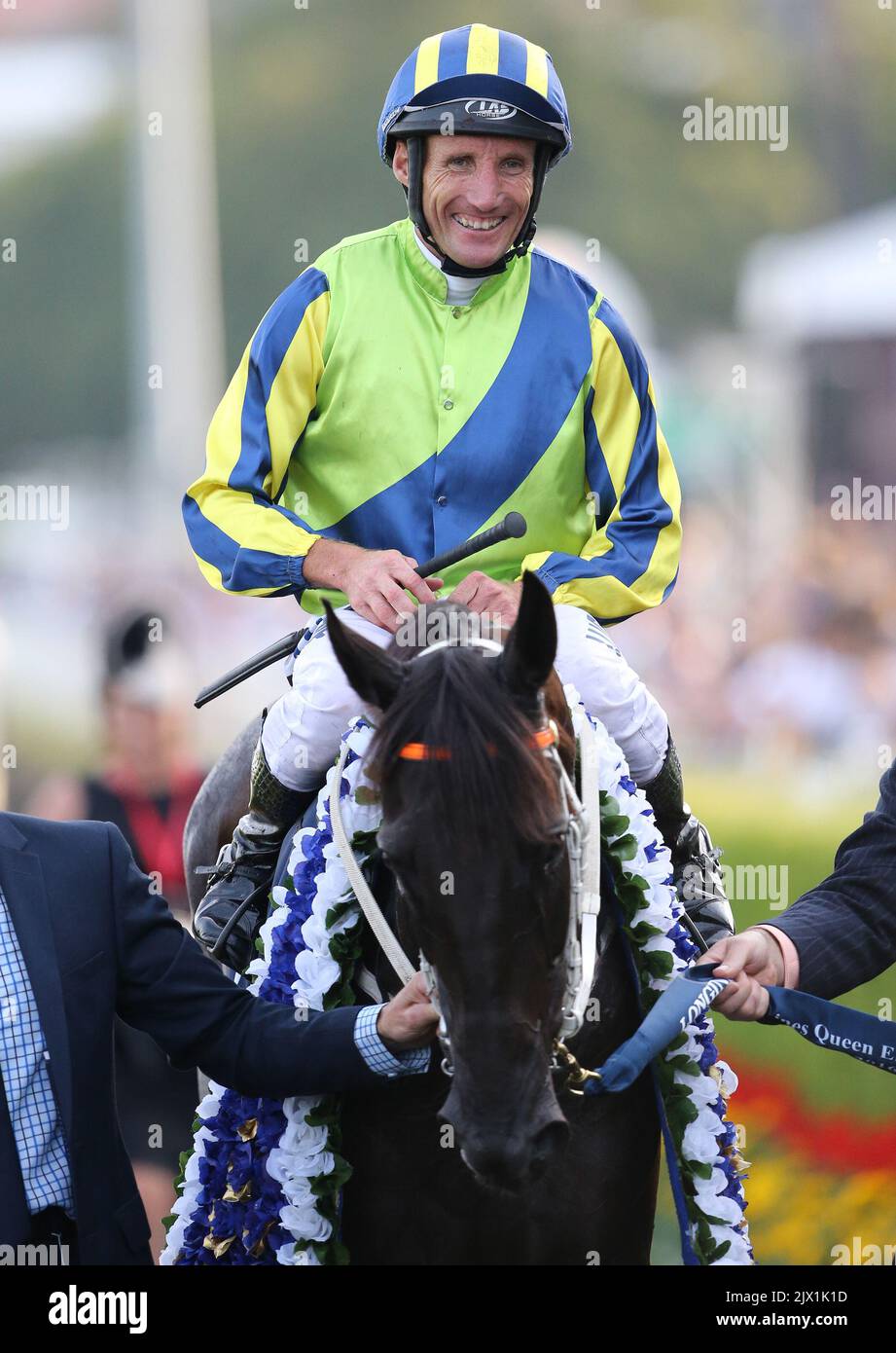 Jockey Damien Oliver on Lucia Valentina celebrates winning the Longines ...