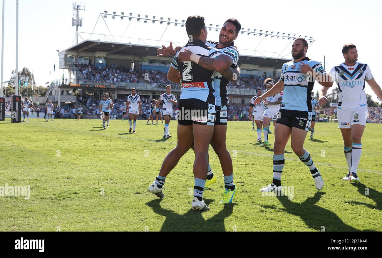 Sosaia Feki of the Sharks celebrates with Ricky Leutele after scoring ...