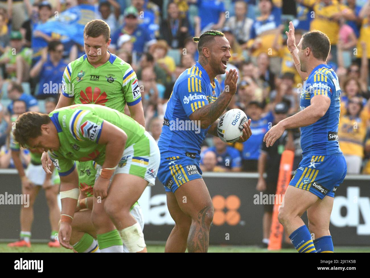Ken Edwards of the Eels celebrates with Michael Gordon (R) after ...