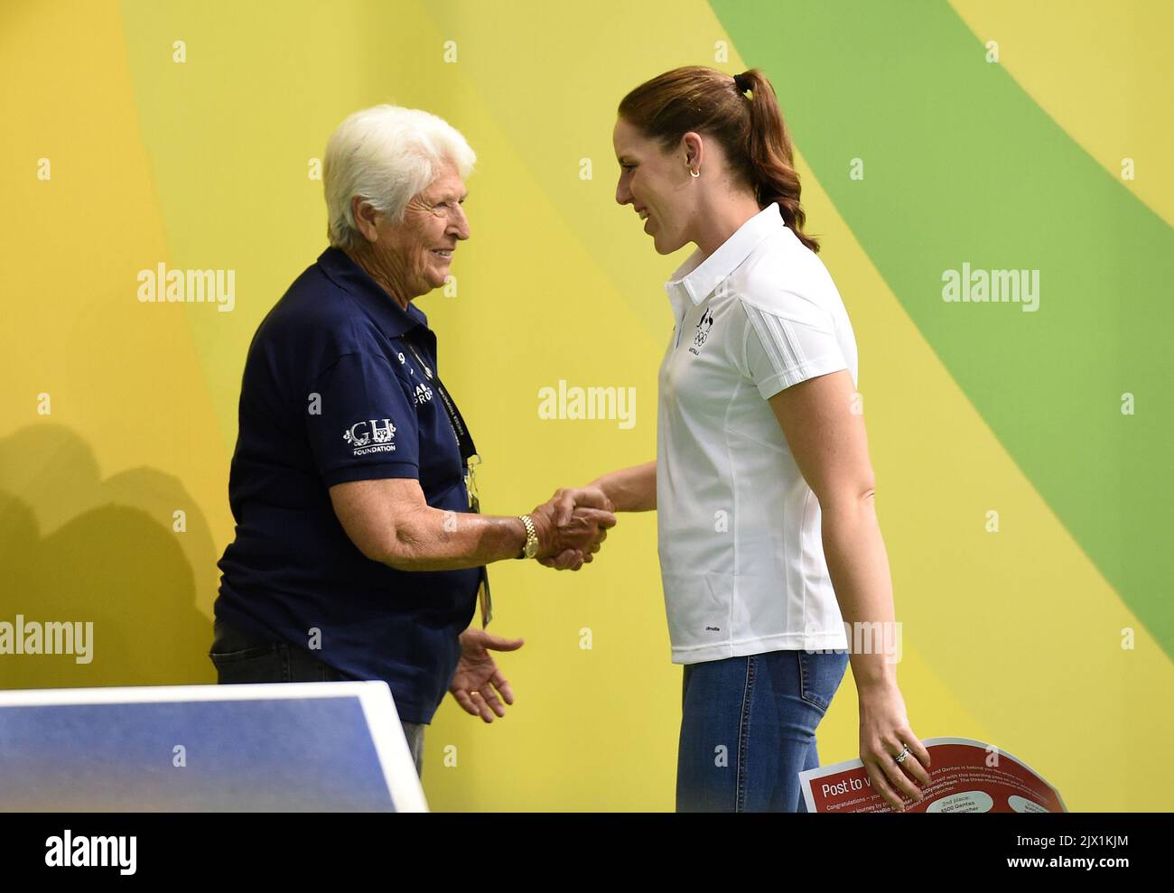 Alicia Coutts is congratulated by former Australian Olympic swimmer ...