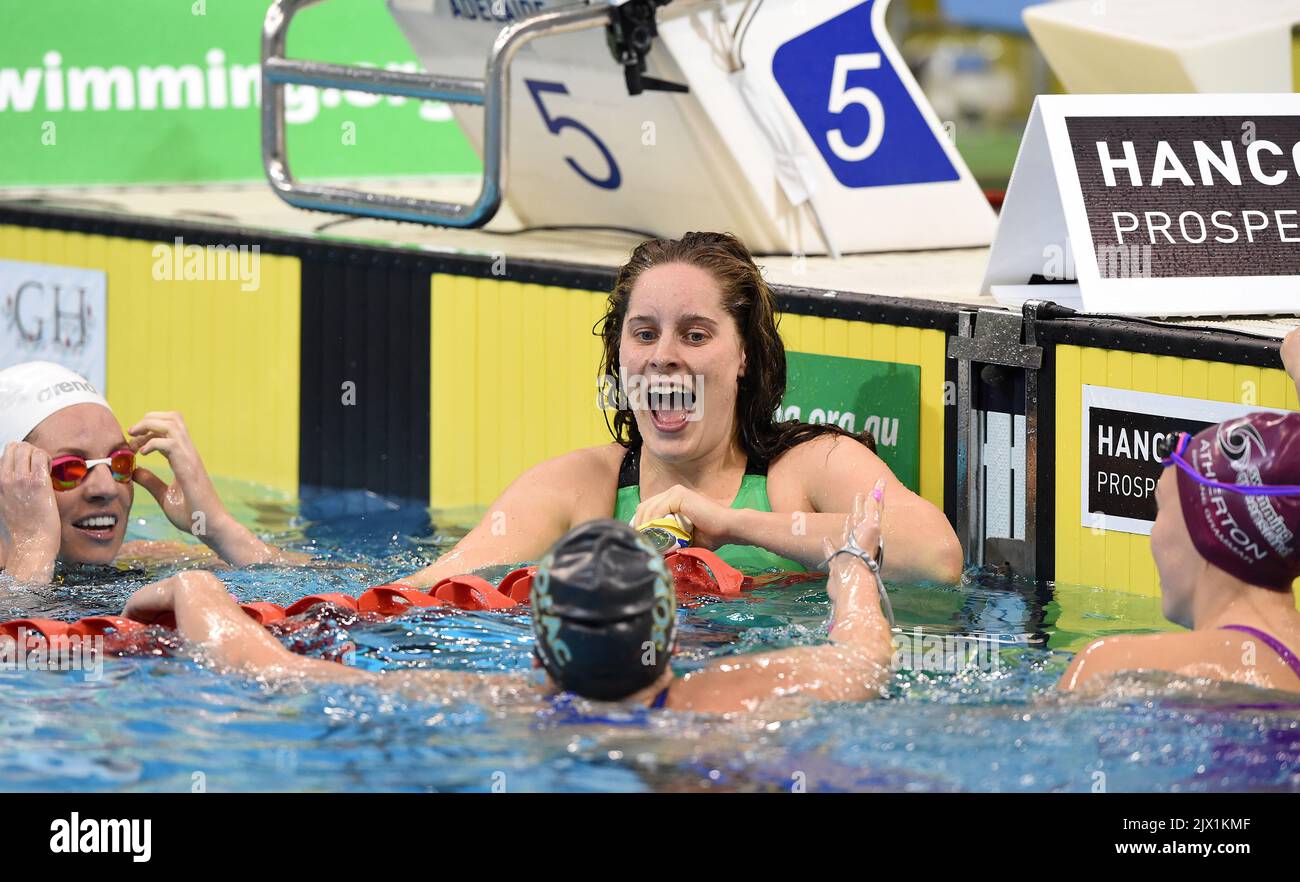 Belinda Hocking (centre) reacts after winning the Women's 200m ...