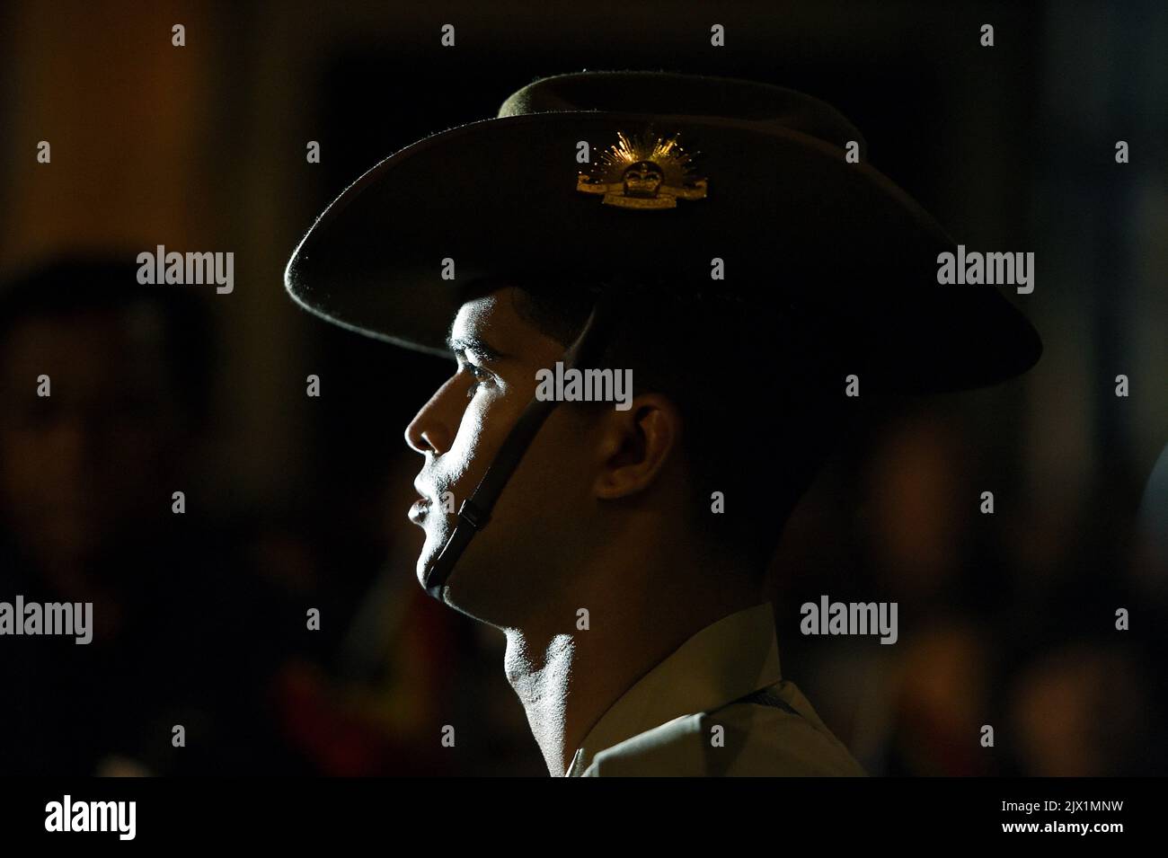 A member of the catafalque party stands guard during the Anzac Day dawn ...