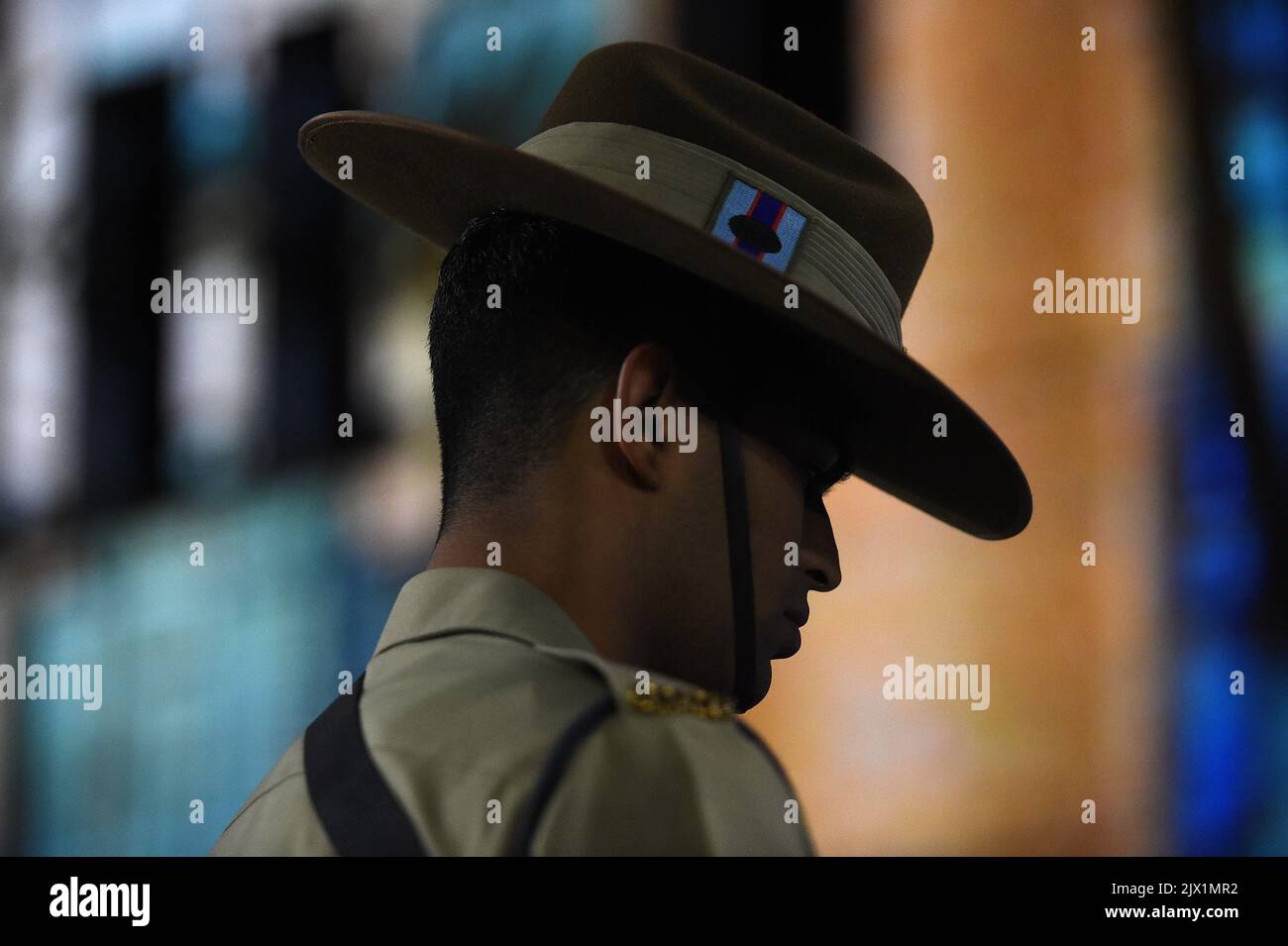 A member of the catafalque party stands guard during the Anzac Day dawn ...