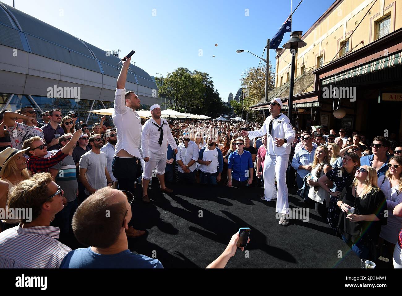 patrons take part in a traditional game of Two-Up on Anzac Day, at the ...