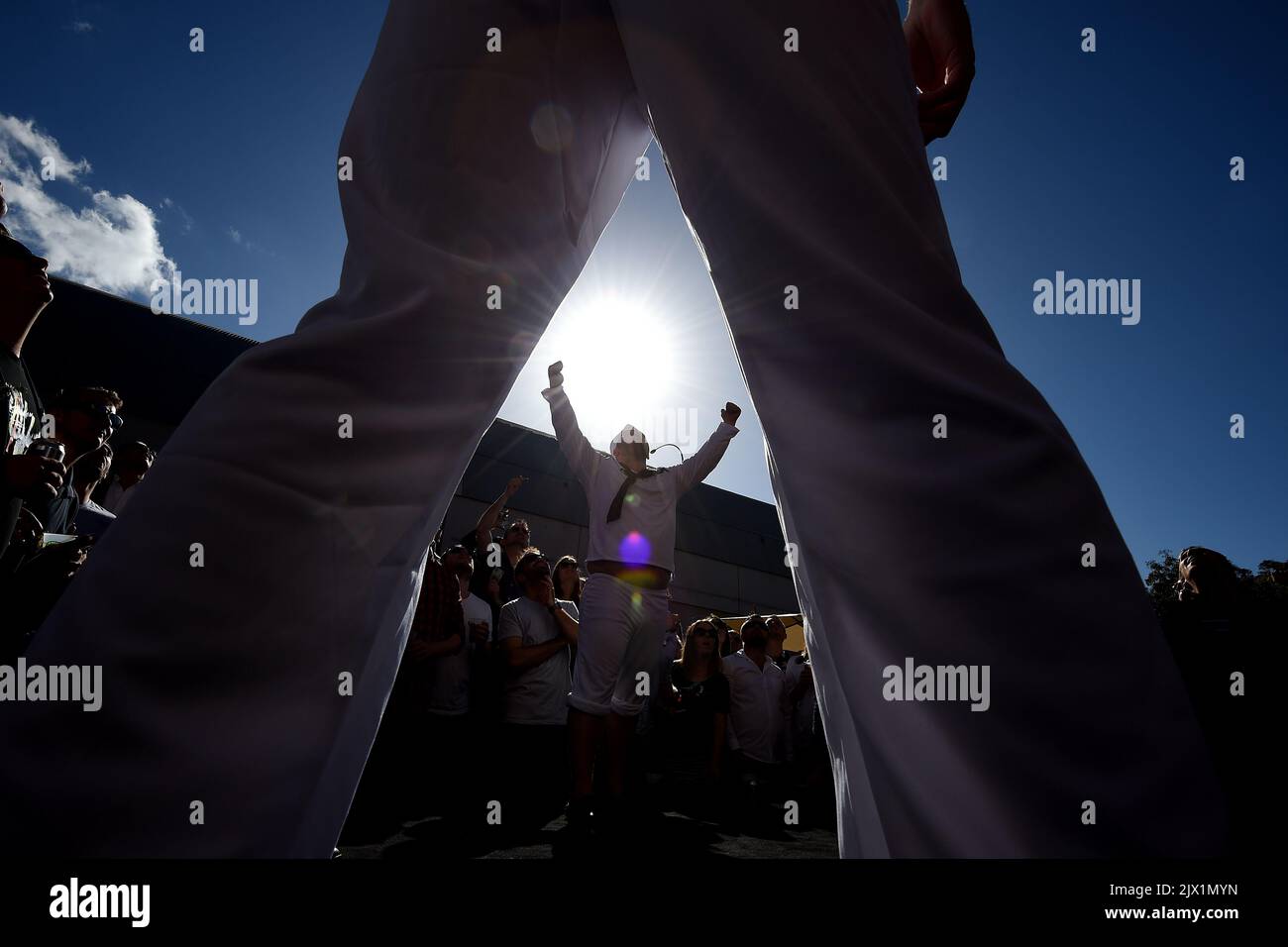 patrons take part in a traditional game of Two-Up on Anzac Day, at the ...