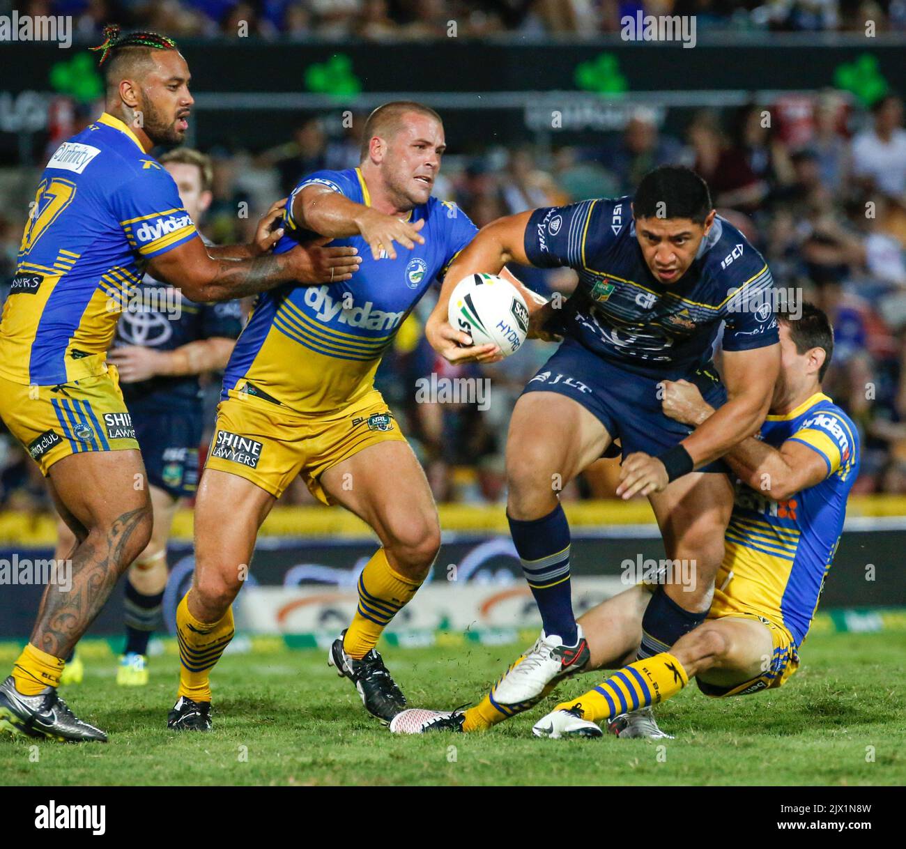 Cowboys Jason Taumalolo tackled by Eels from left, Kenny Edwards, Danny ...