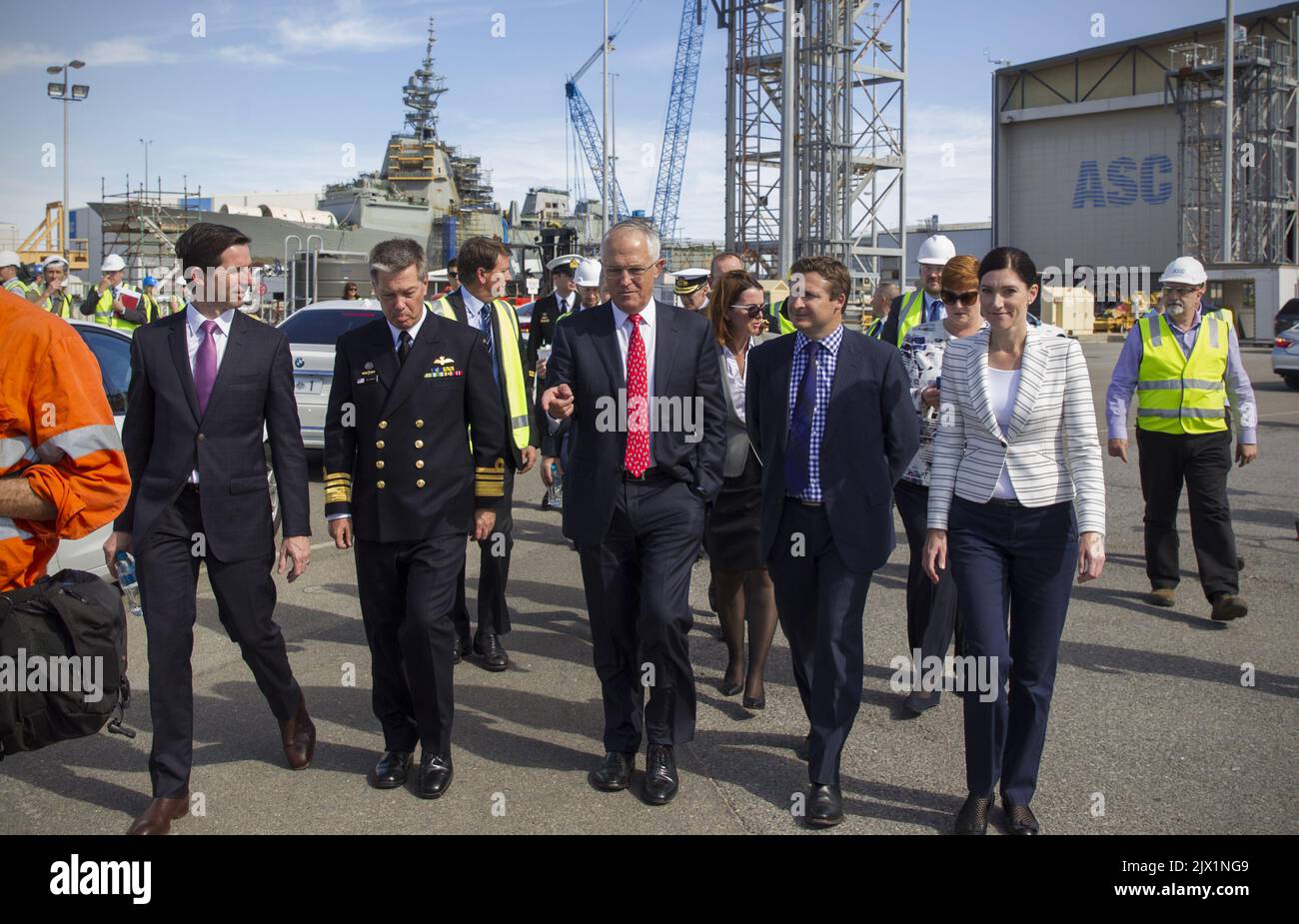 Australian Prime Minister Malcolm Turnbull walks with Vice Admiral ...