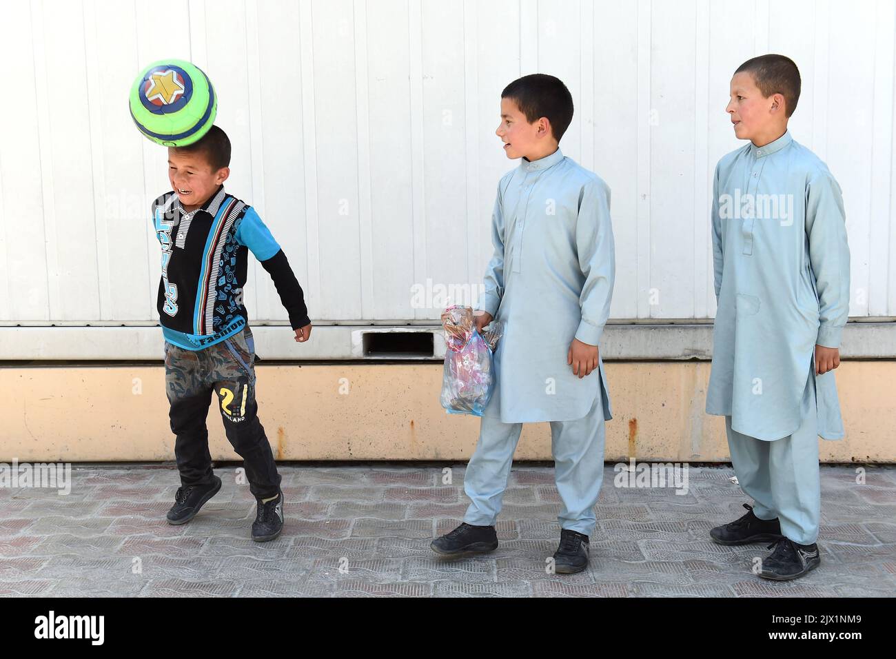 Orphans play during a visit to an Australian Embassy residence in Kabul ...