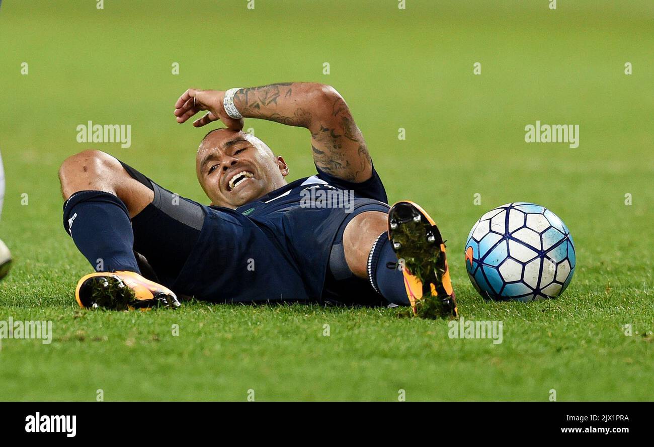 Archie Thompson of the Victory is knocked down during the AFC Champions ...