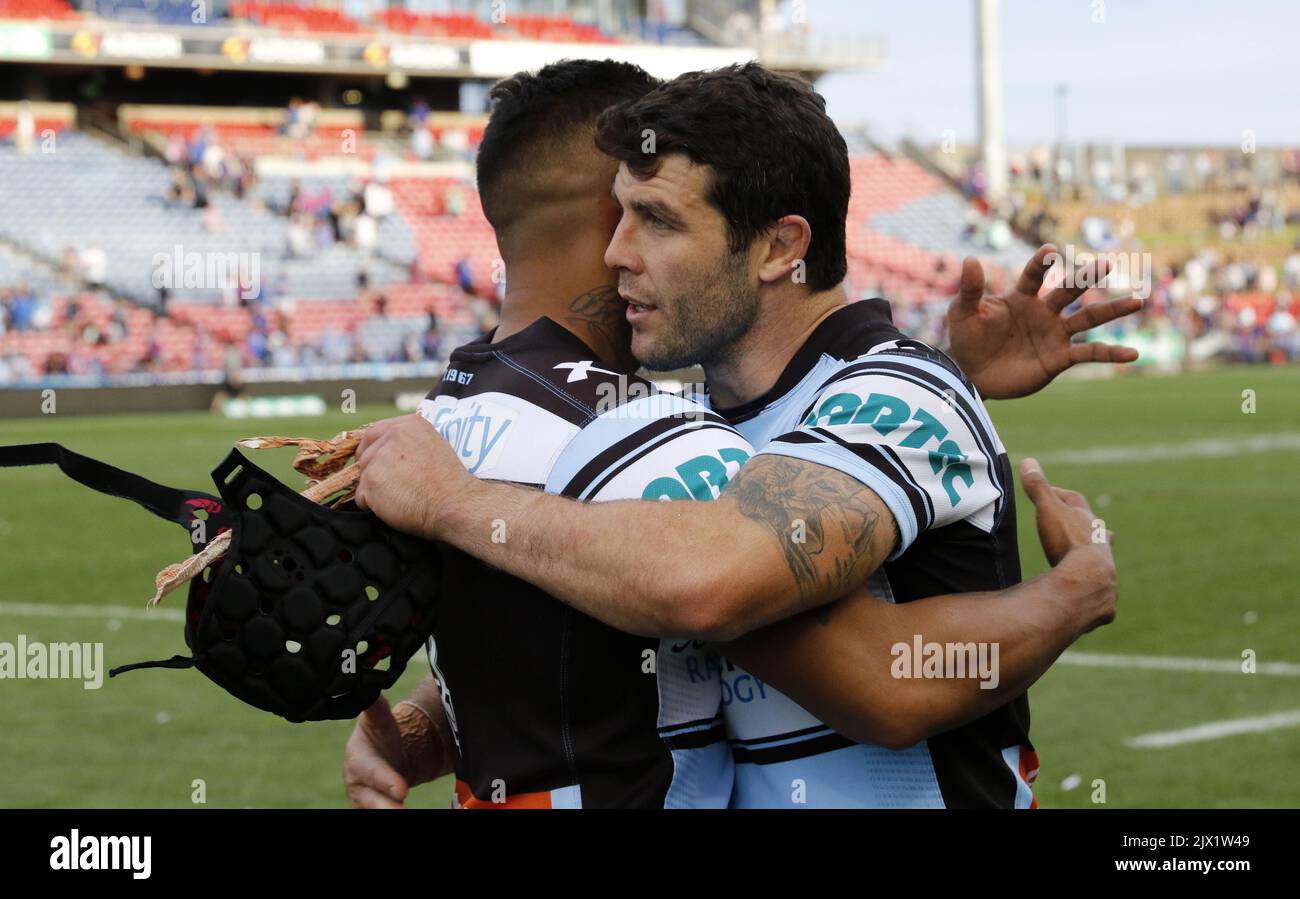 Ben Barba and Michael Ennis of the Sharks embrace after the Round 10 ...