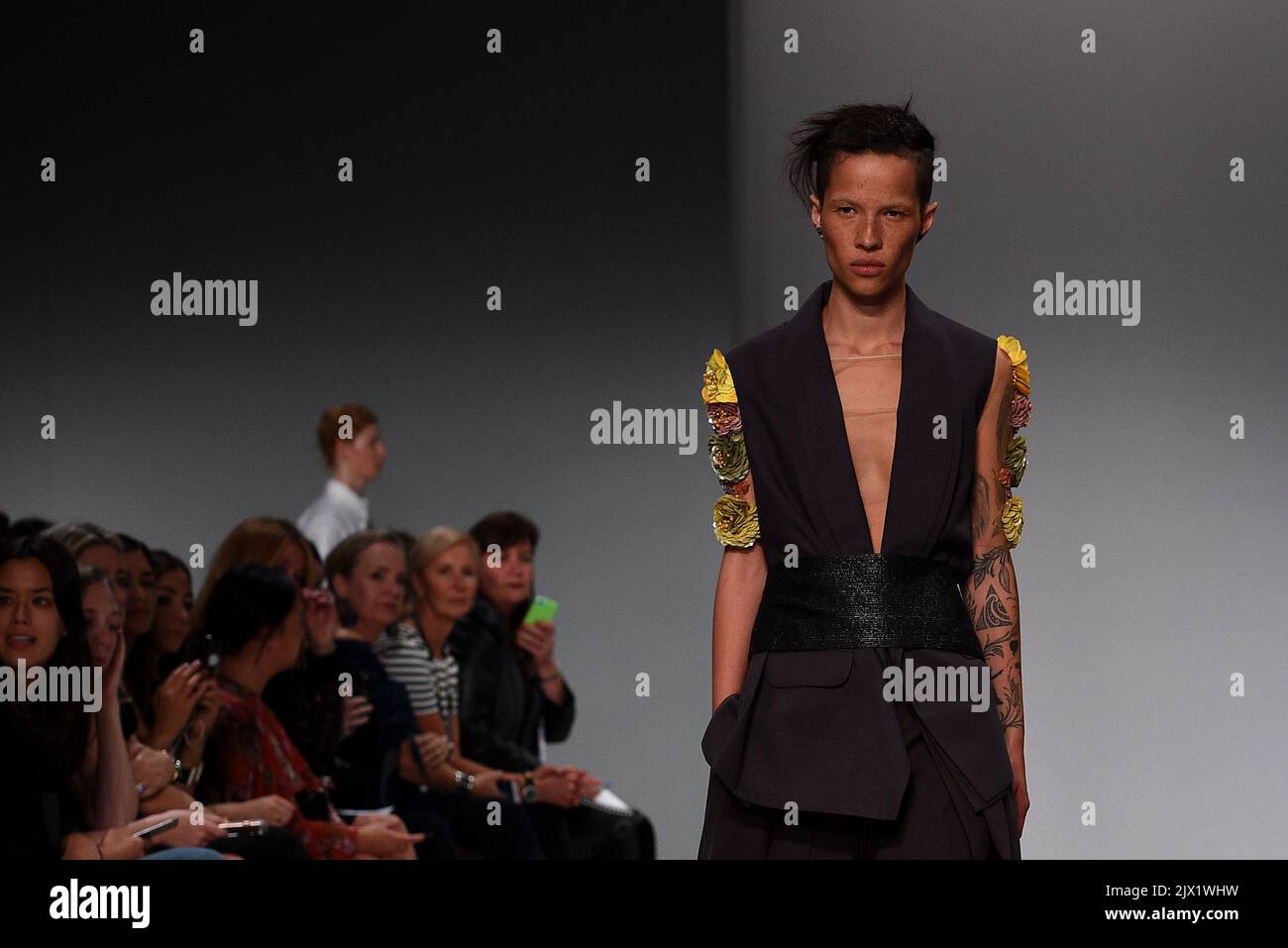 A model walks the runway during the Akira show, at Mercedes-Benz ...