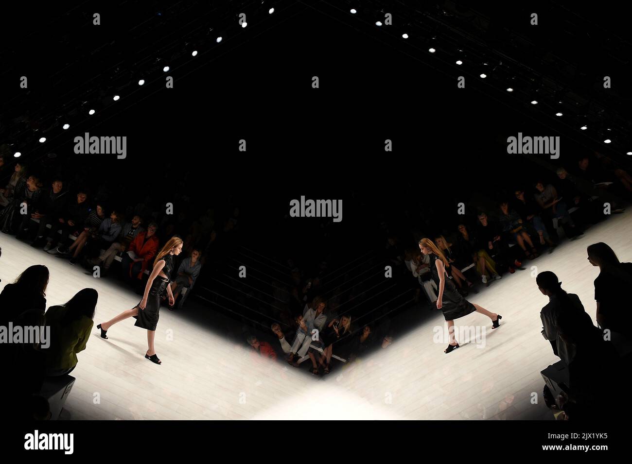 A multiple exposure image created in camera shows a model walks the ...