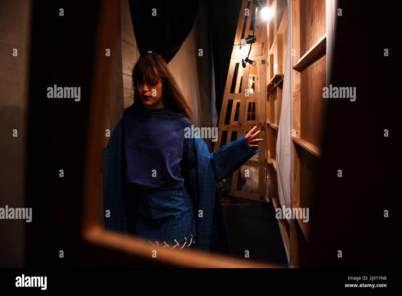 A model pictured backstage before St. George Nextgen show, during ...