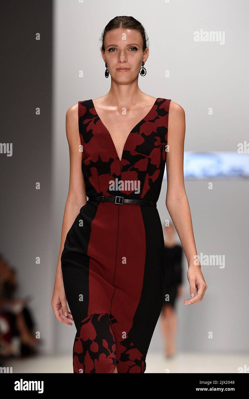 A model walks the runway during the Oscar de la Renta show to close ...