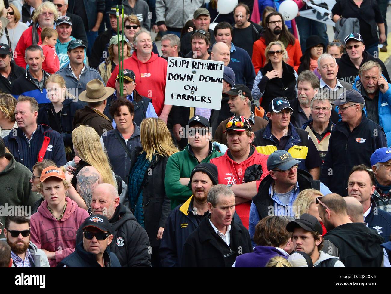 Dairy farmers march from Federation Square to Parliament House during a ...