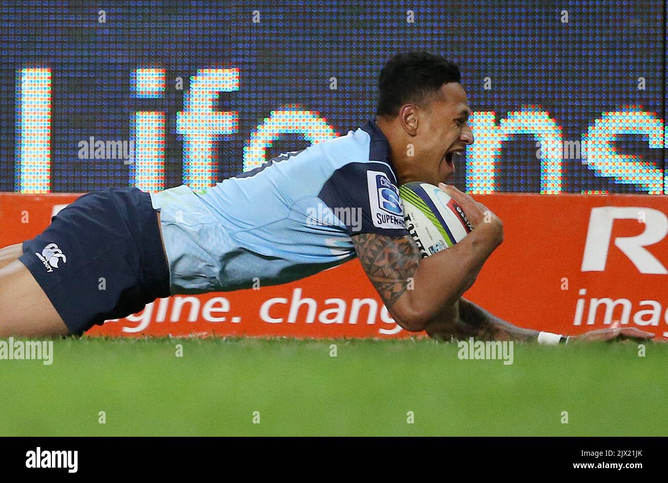 Israel Folau scores a try during the Round 14 Super Rugby match between ...