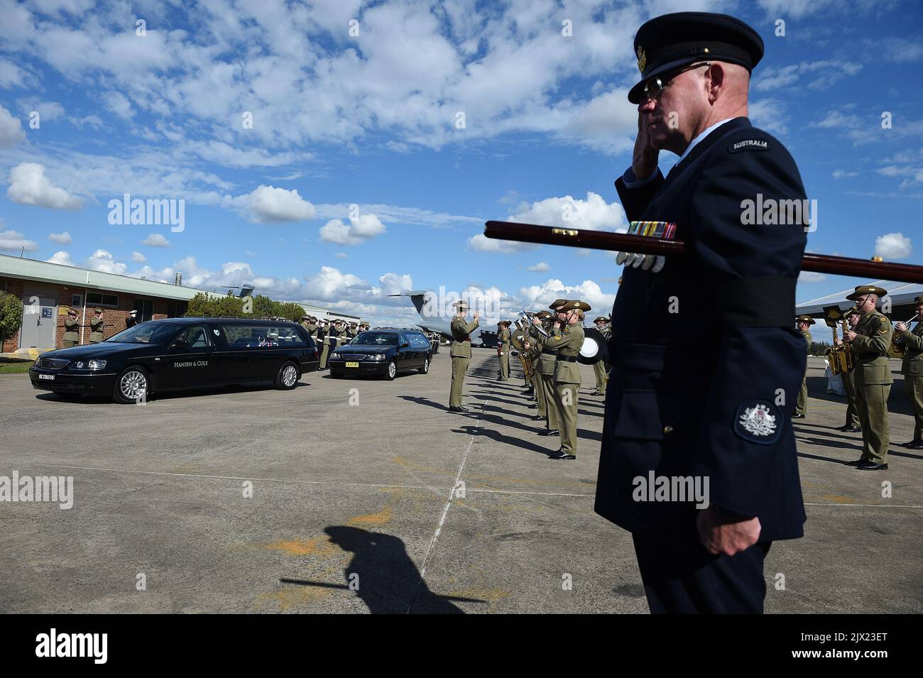 An honour guard made up of Australian Defence Force personnel, stands ...
