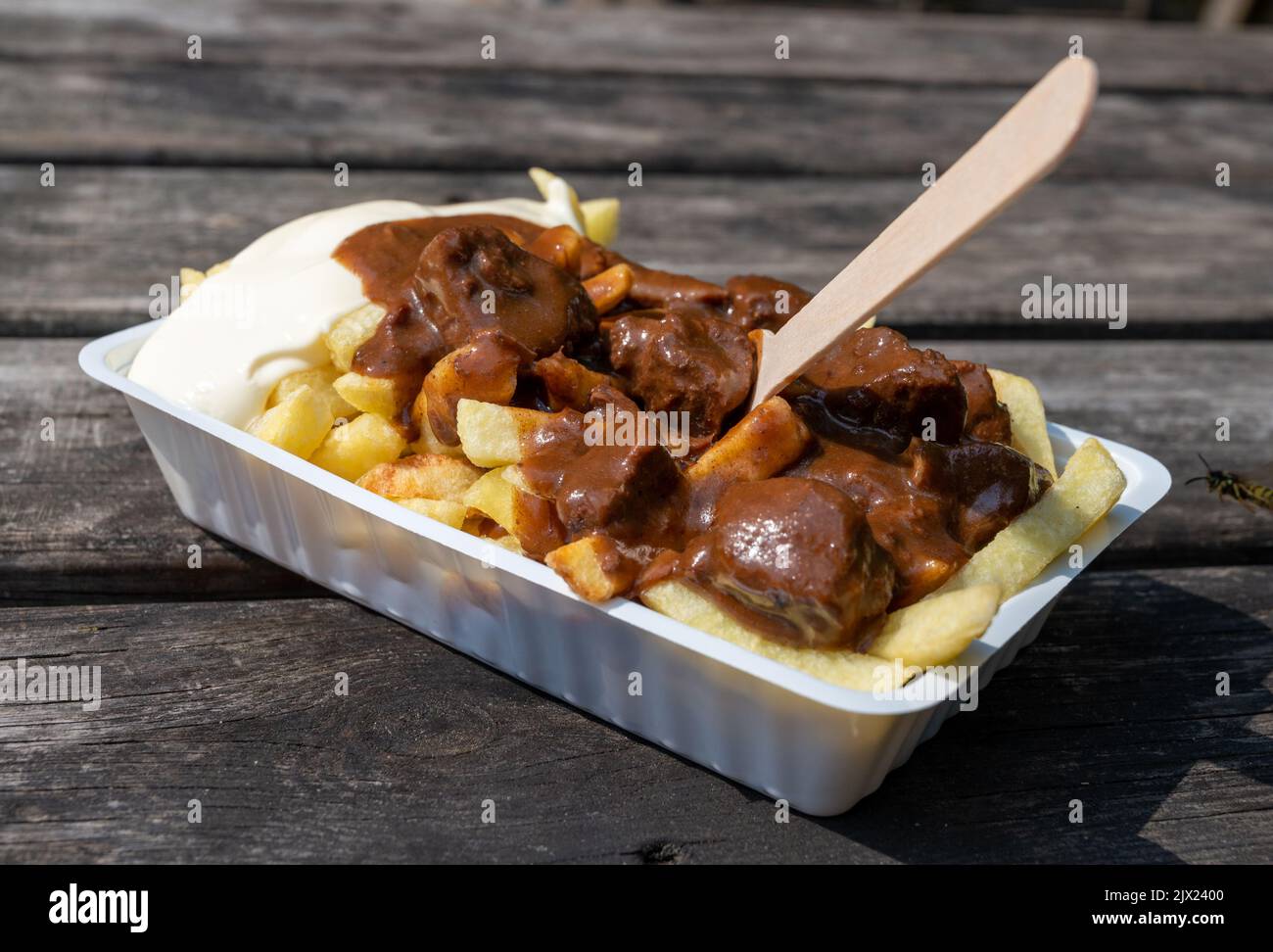 Traditional fast and street food in Belgium, French fried potatoes with ...