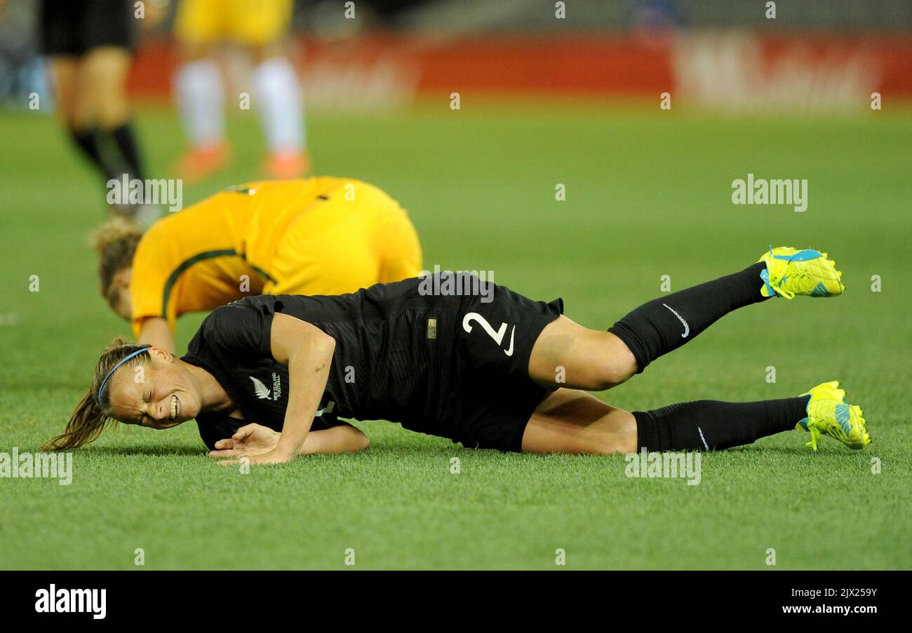 Ria Percival of New Zealand and Stephanie Catley of the Matildas crash ...