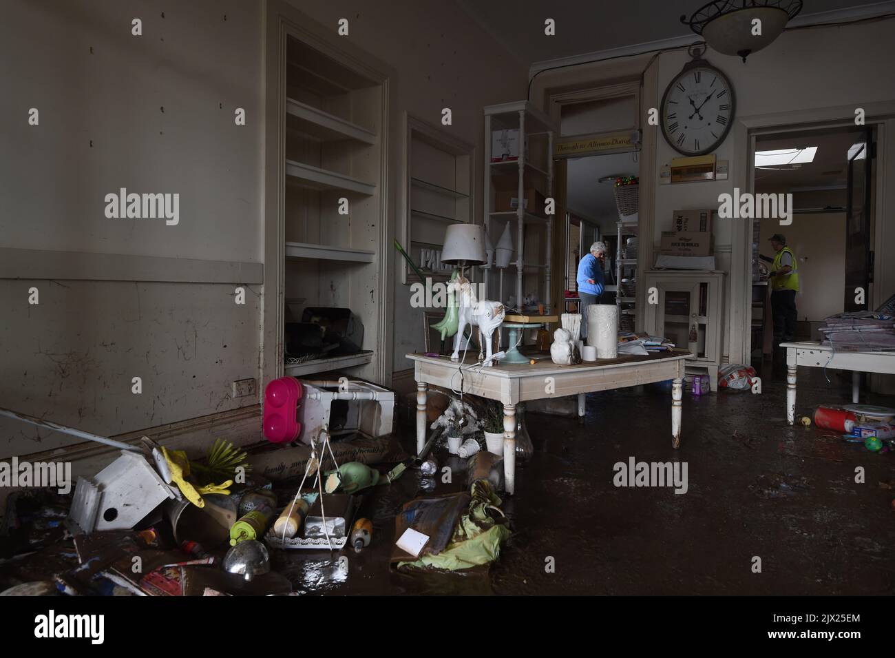 Furniture, mud and water is strewn through the almost 200 year old home ...
