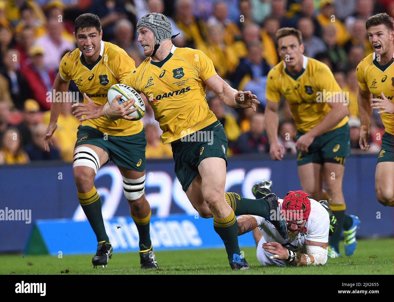 Wallabies player David Pocock breaks the line during the First Test ...