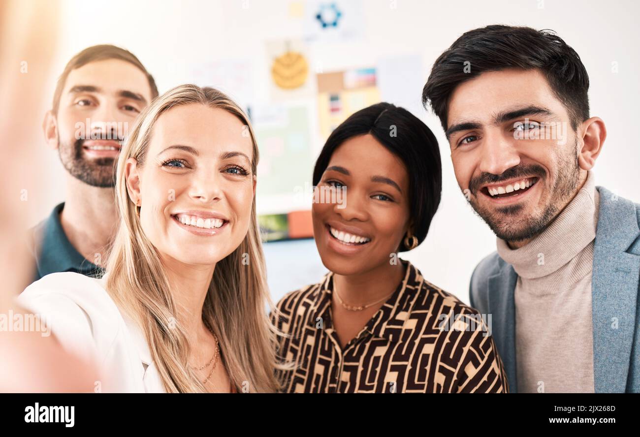 Creative, corporate and happy team taking a selfie on a phone in office ...