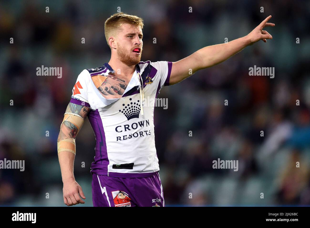 Cameron Munster of the Storm gestures during the Round 14 NRL match ...