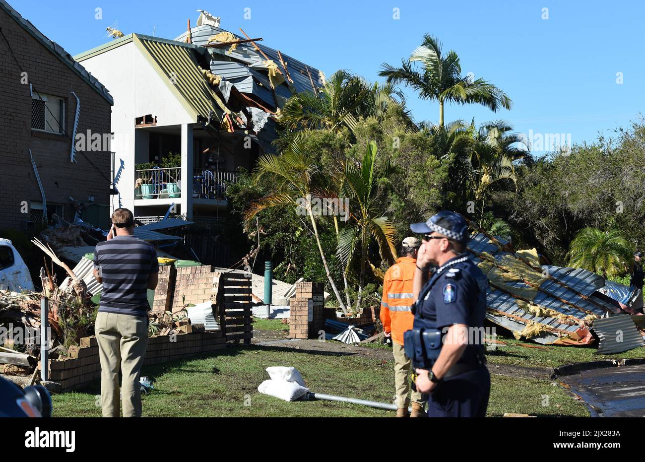 Extensive storm damage to houses is seen in Mooloolaba on the Sunshine ...