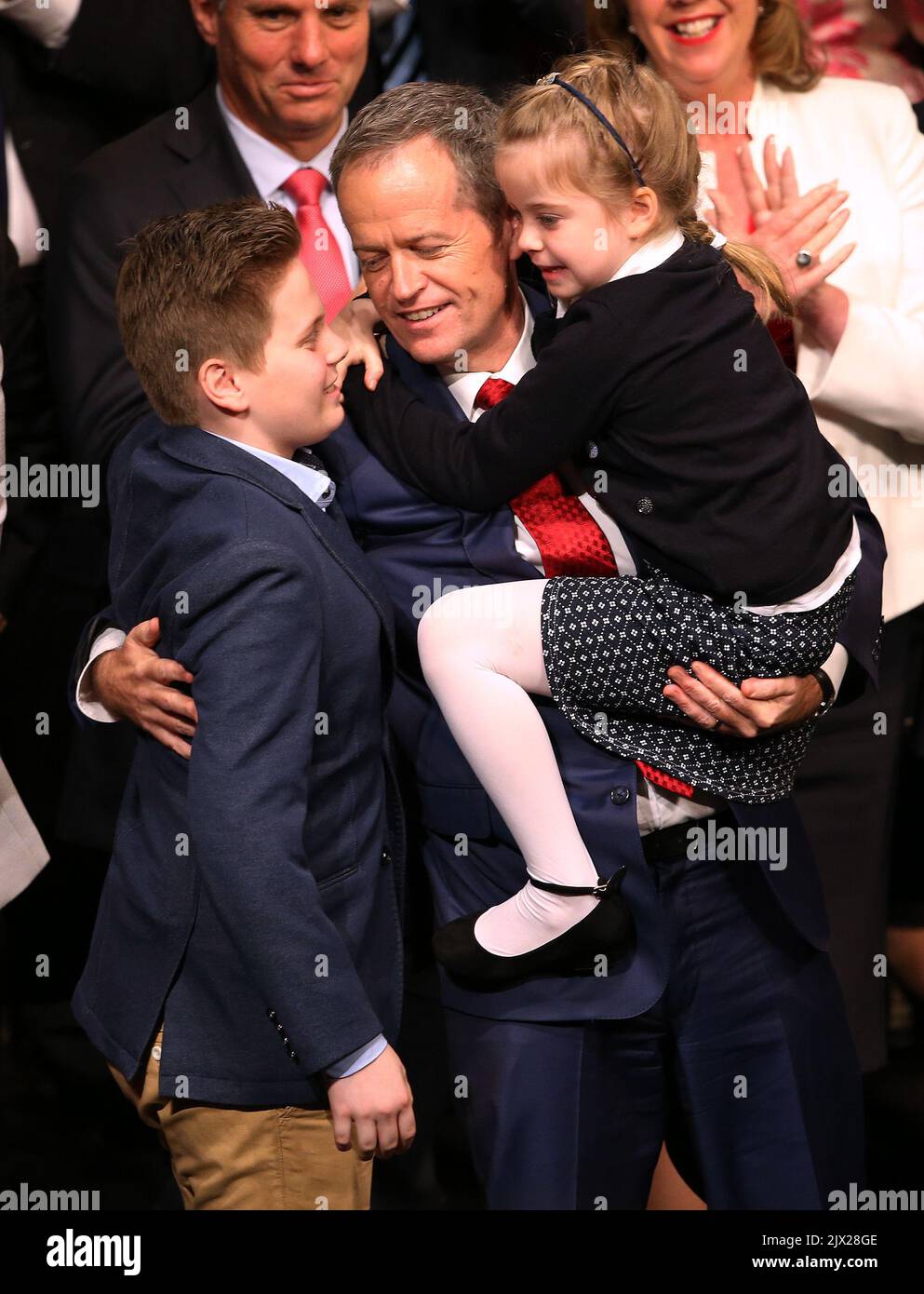 Australian Labor Party (ALP) leader Bill Shorten stands with his son ...
